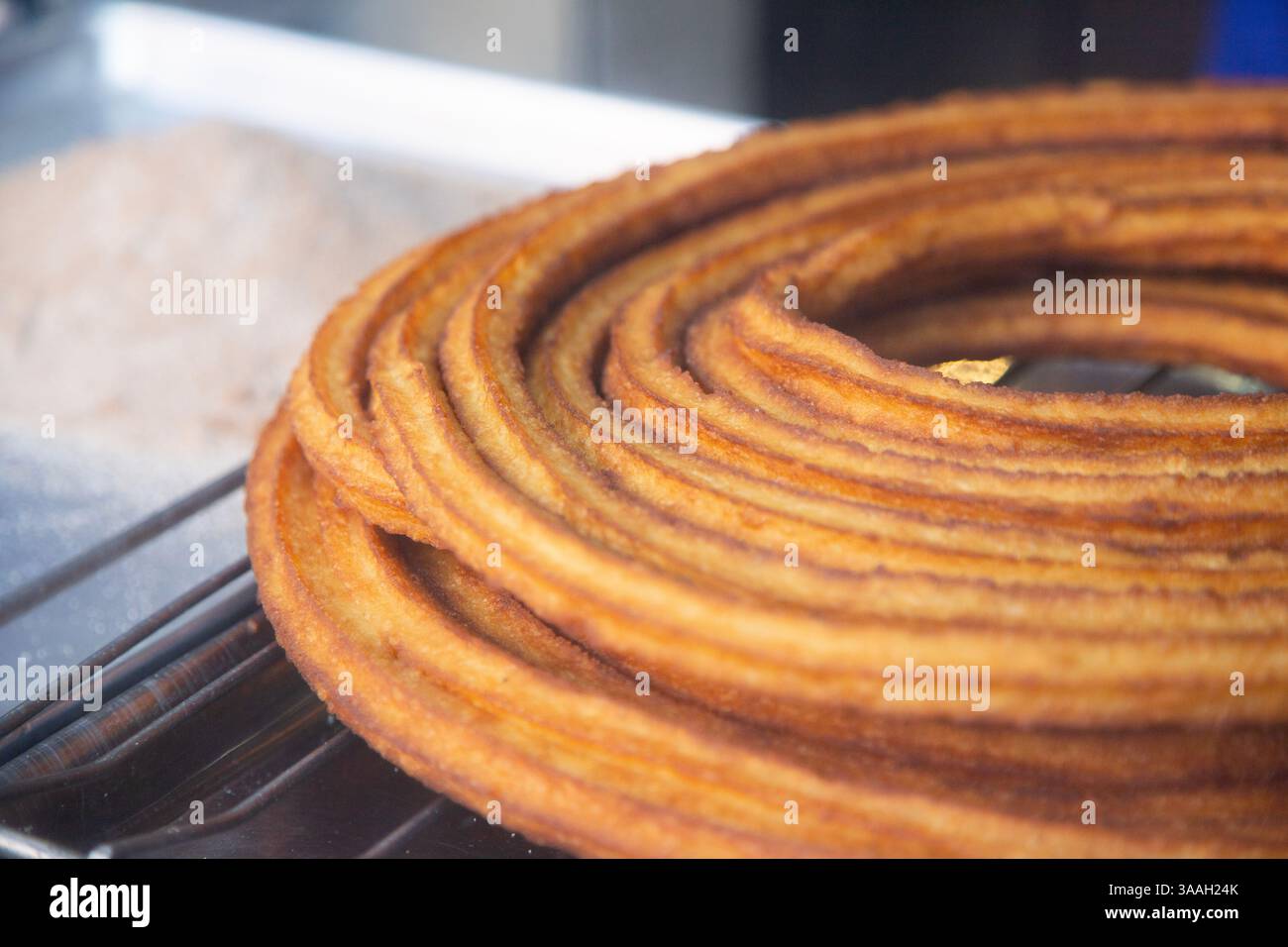 Traditional candy stand with churros, honey and typical pastries from ...