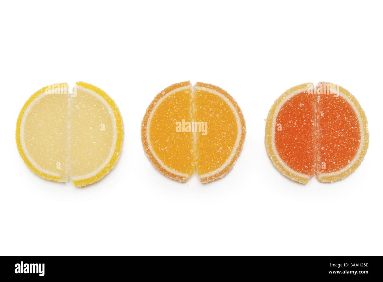 Three round jelly candy on a white background Stock Photo - Alamy