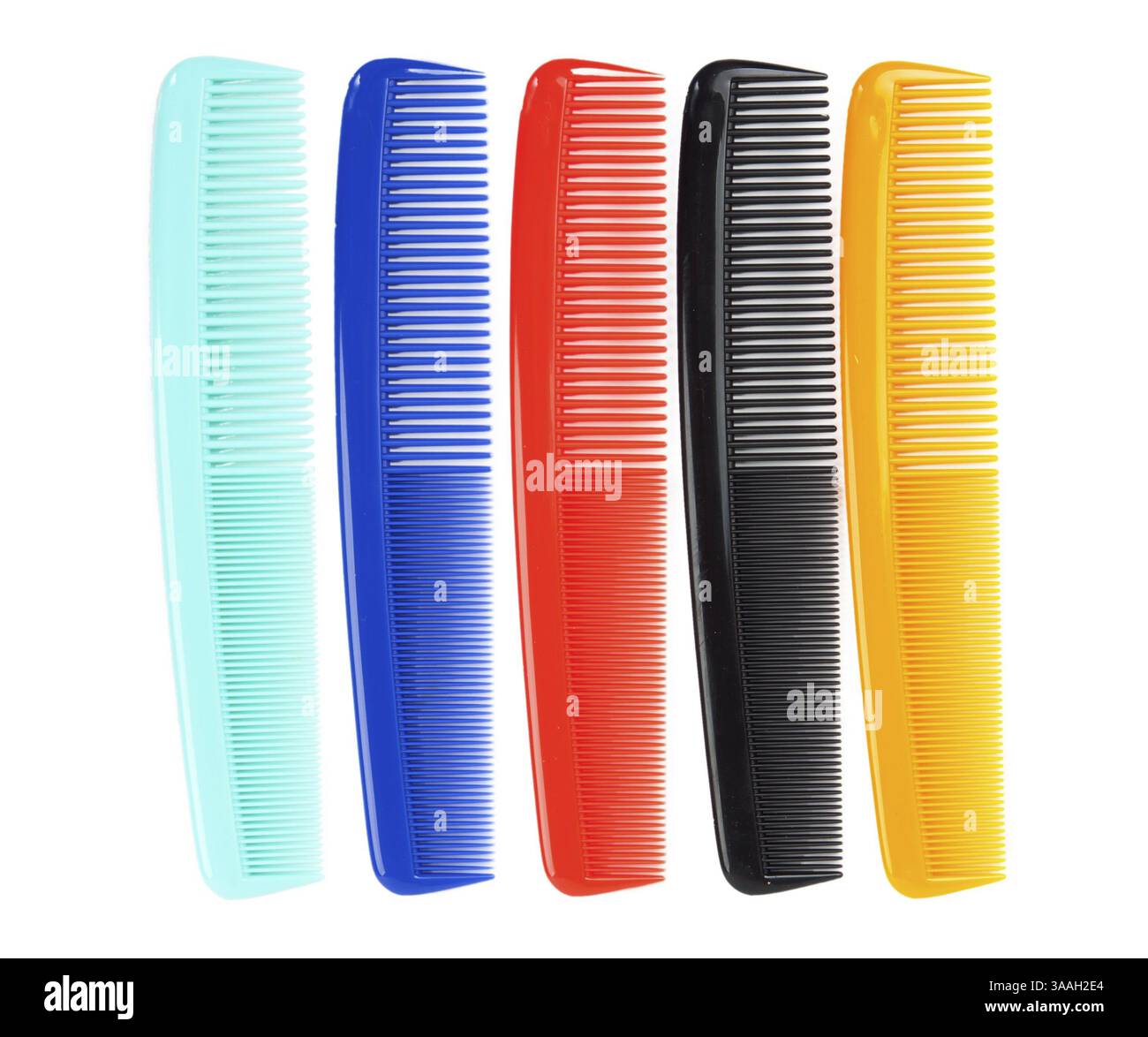 Colored plastic comb isolated on white background Stock Photo - Alamy