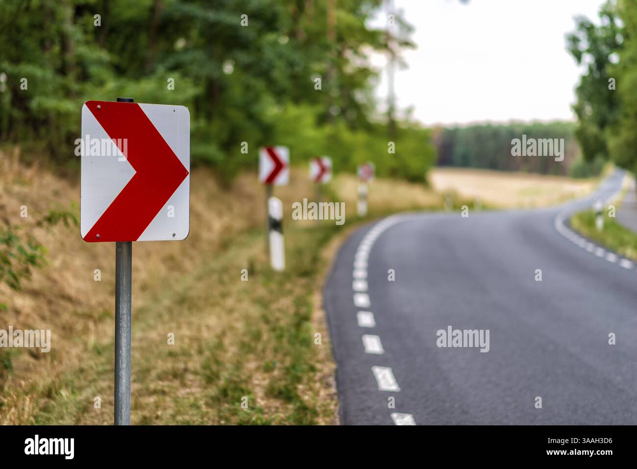 Country road in Germany with a sharp bend Stock Photo - Alamy