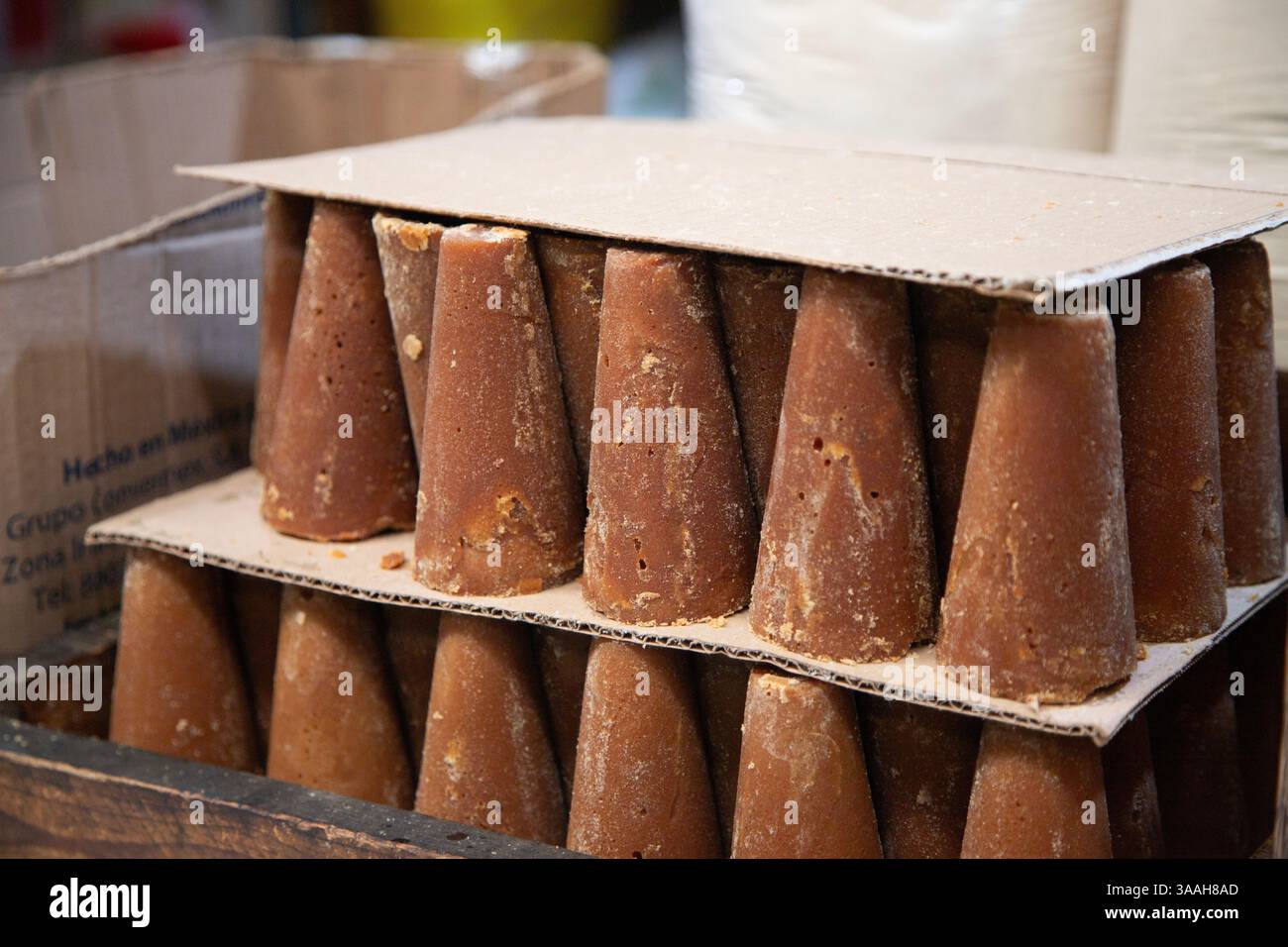 Pieces of panela raw organic sugar in a market in the city of Puebla ...