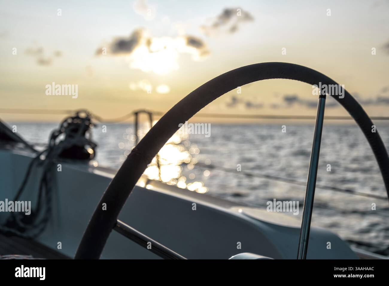 Steering wheel in the cockpit of a sailing yacht Stock Photo - Alamy