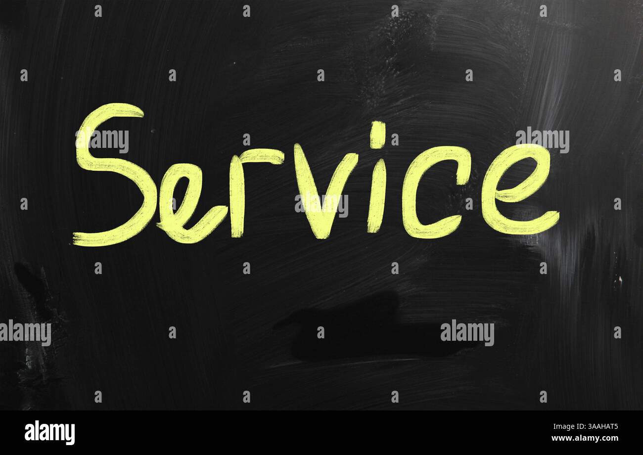 Service handwritten with white chalk on a blackboard Stock Photo - Alamy