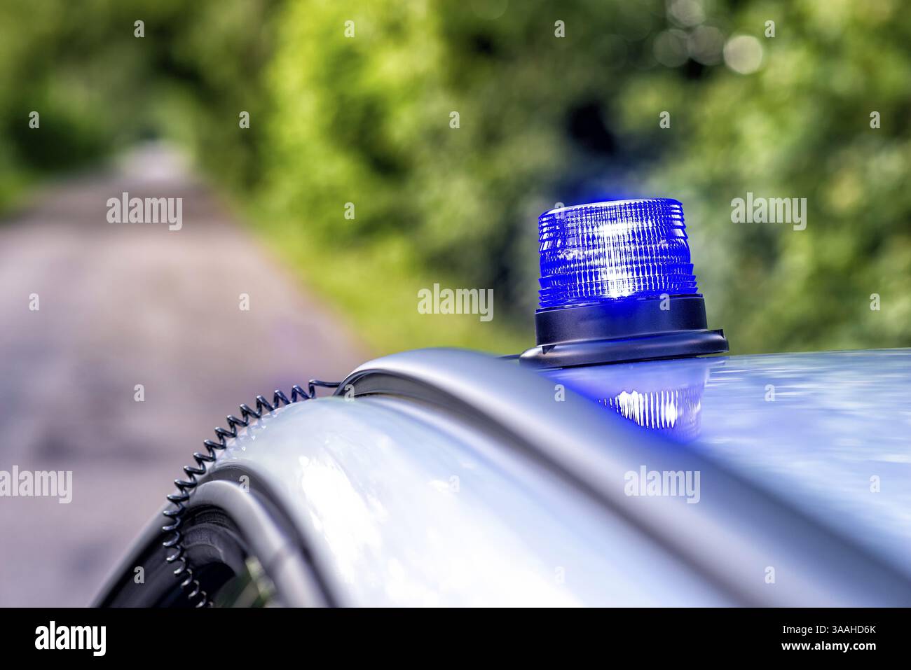 Blue flashing light on a police vehicle during a blue light run Stock ...