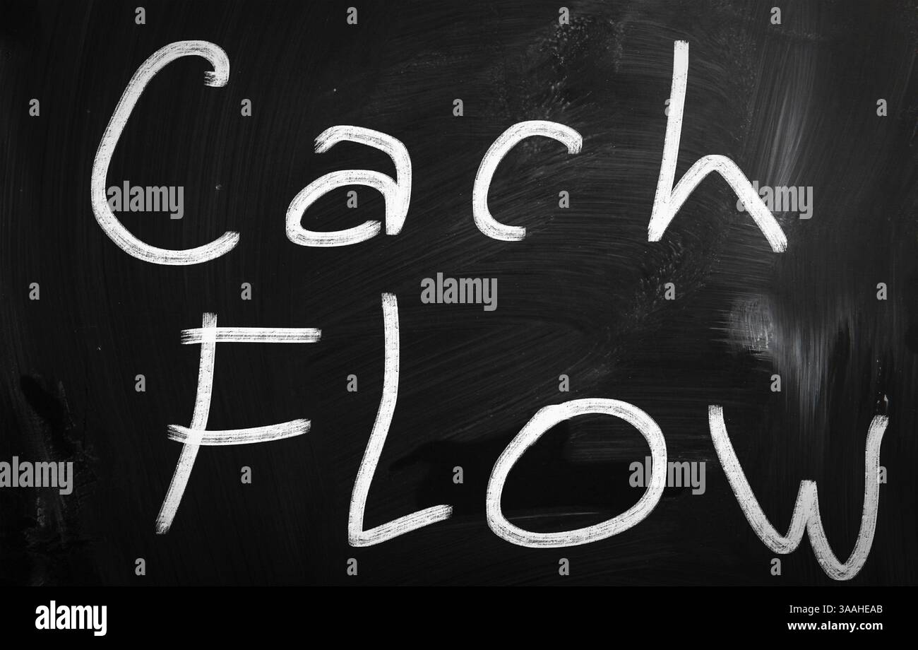 Cash flow handwritten with white chalk on a blackboard Stock Photo - Alamy