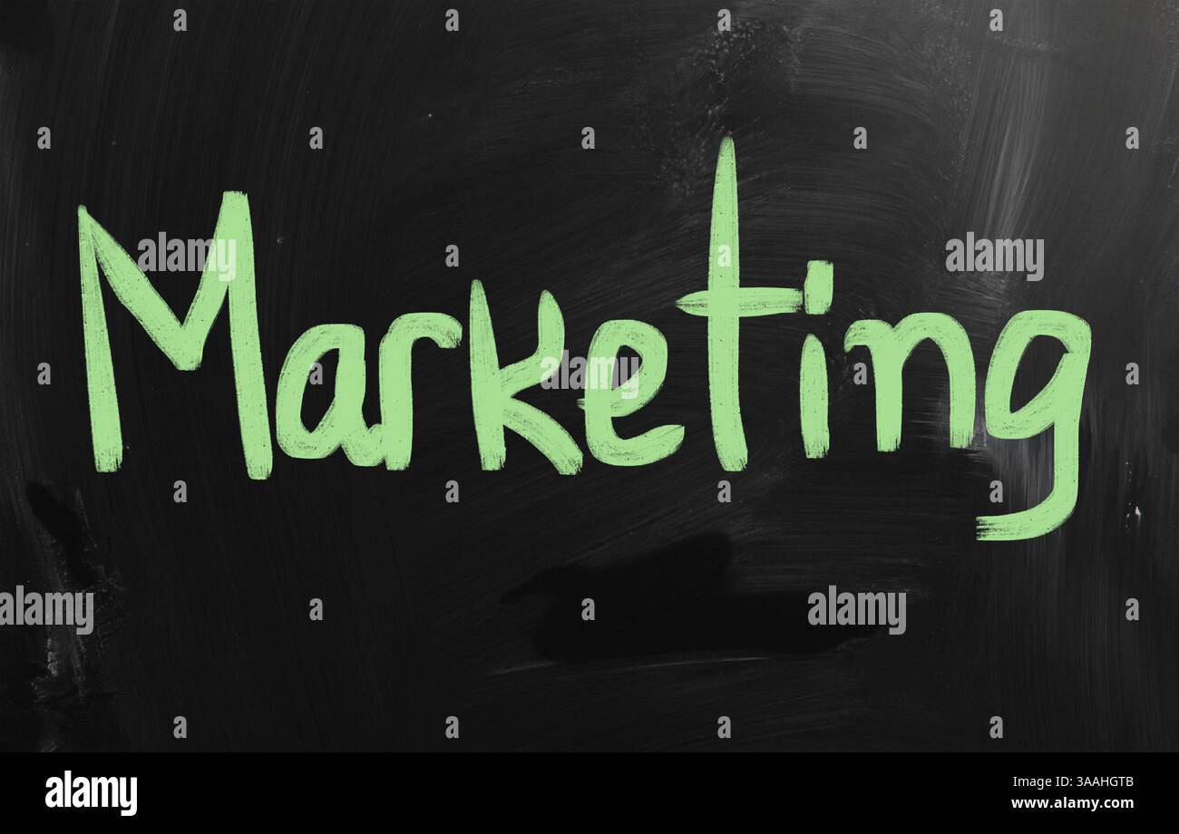 Marketing handwritten with white chalk on a blackboard Stock Photo - Alamy