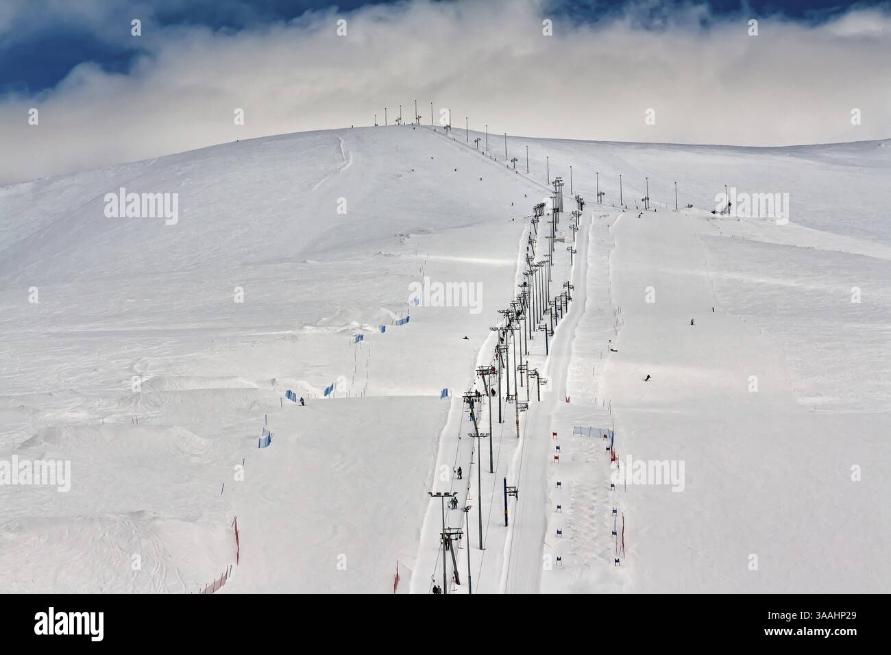 Ski lifts snowy slope hi-res stock photography and images - Alamy