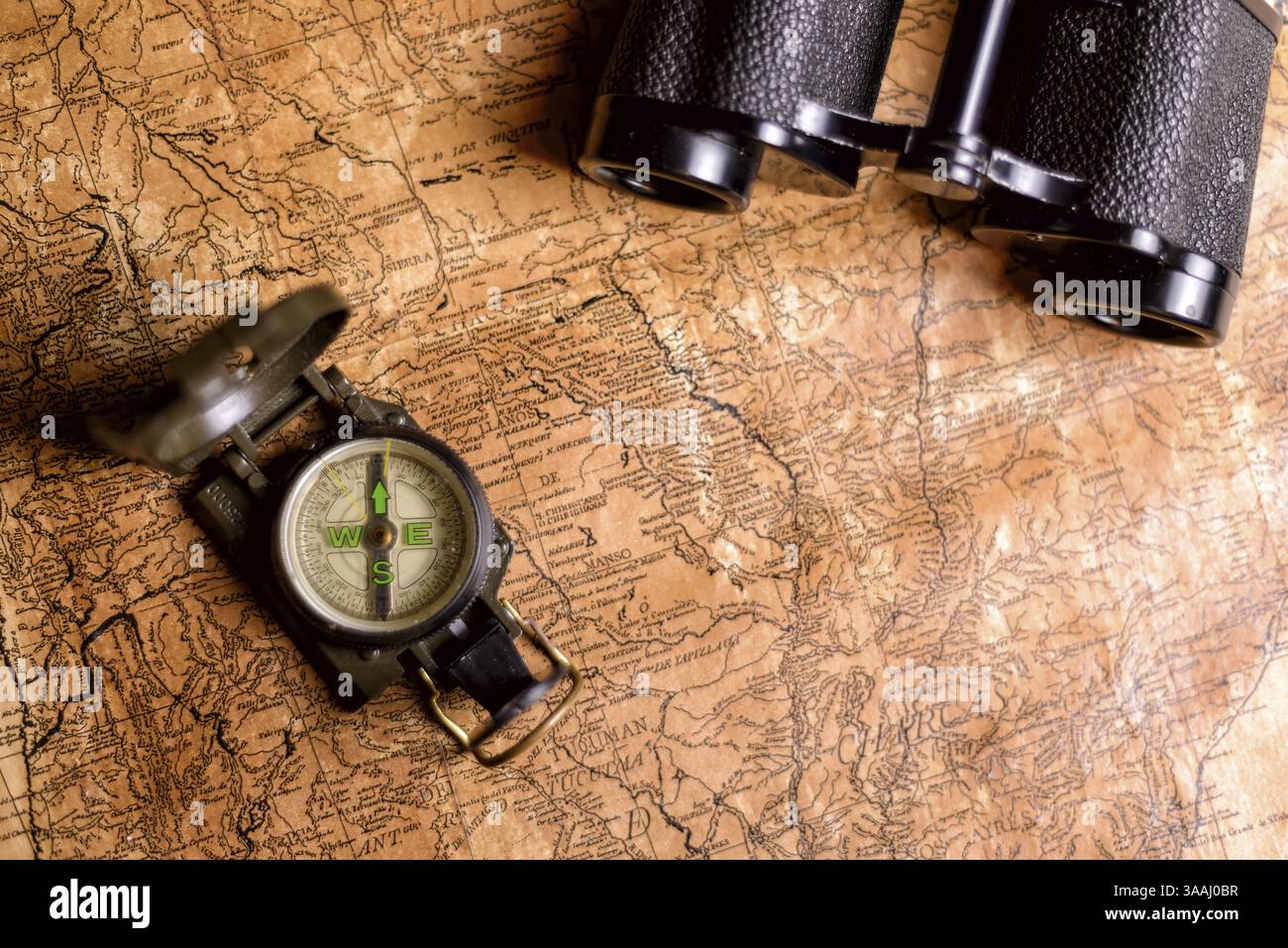 Old expedition map with compass and binoculars Stock Photo - Alamy