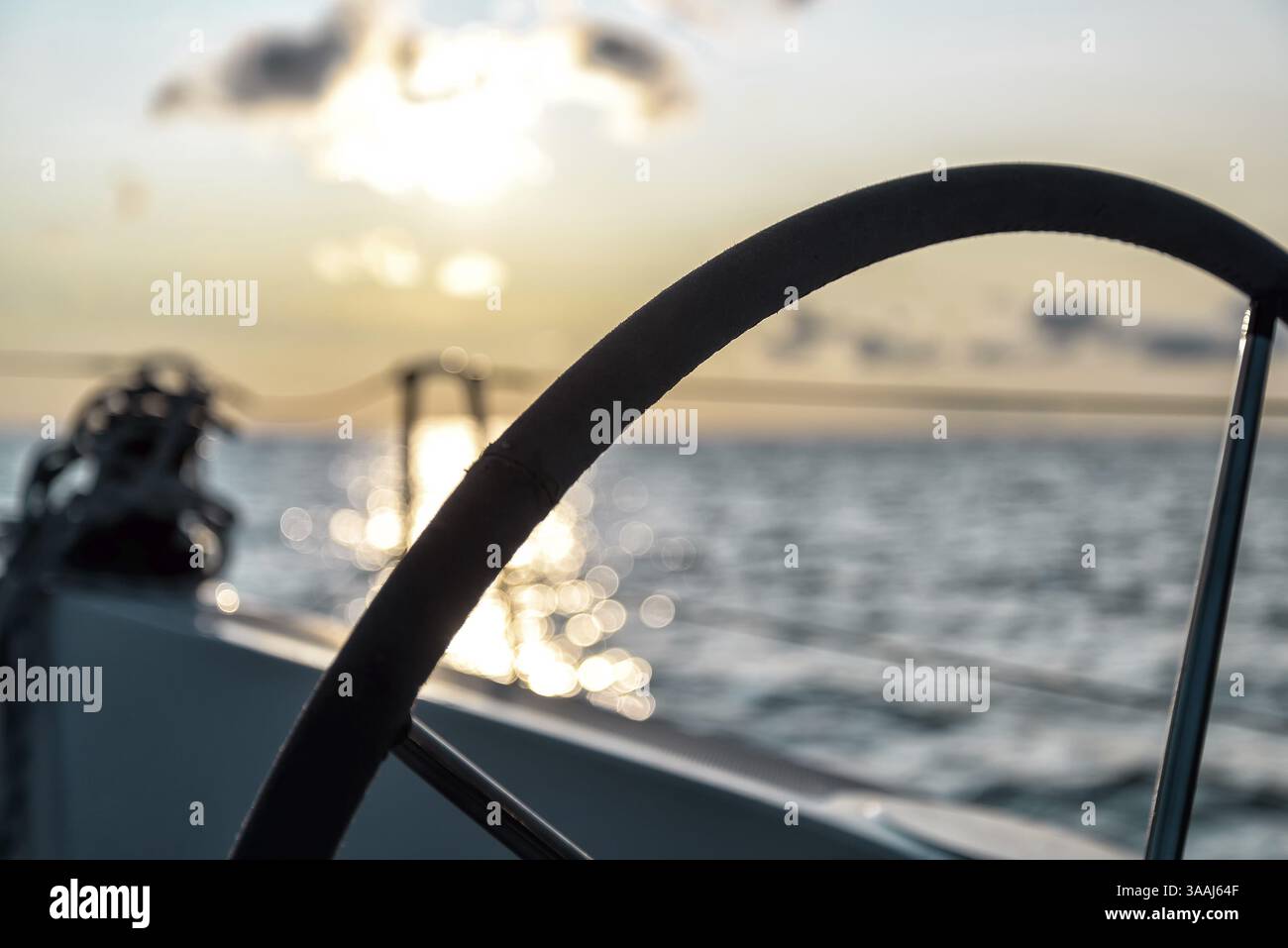 Steering wheel in the cockpit of a sailing yacht Stock Photo - Alamy