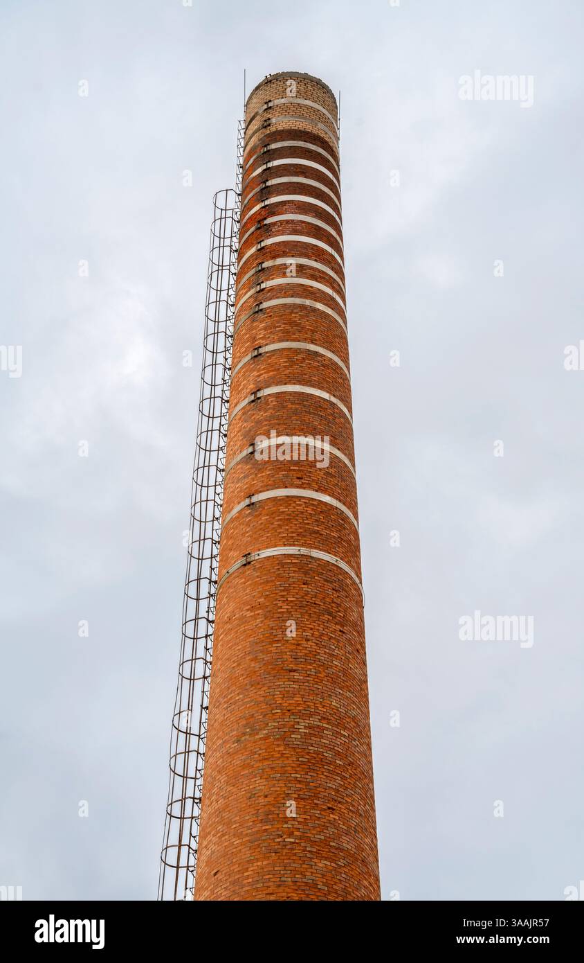 Ladder on brick chimney stack hi-res stock photography and images - Alamy