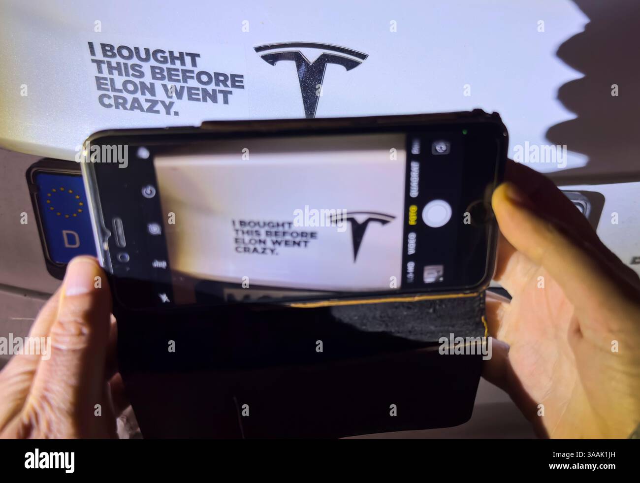 Tesla sticker „ I bought this before Elon went crazy“ on a Tesla car ...