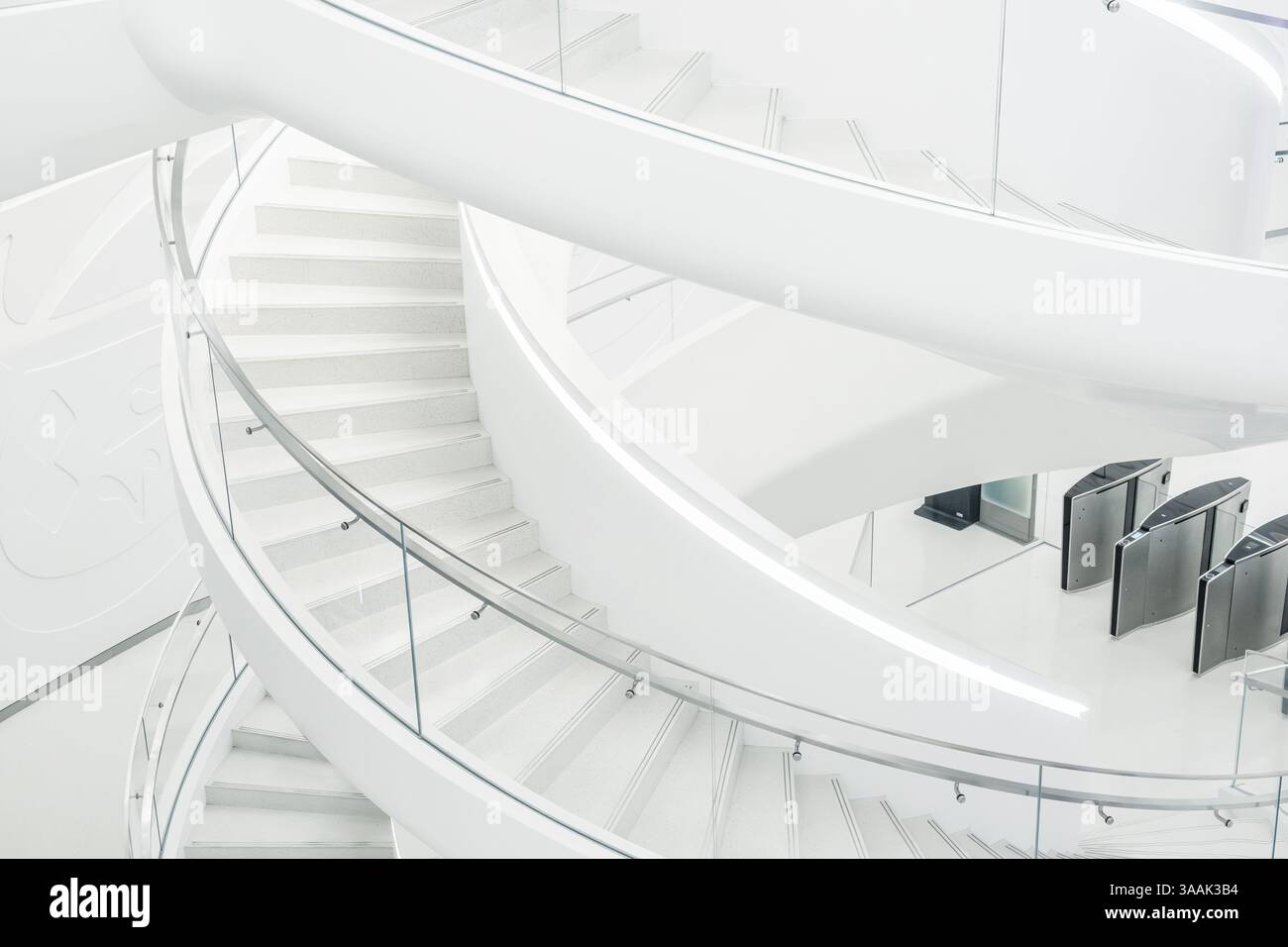 Minimalistic white spiral staircase with smooth curves and geometric ...