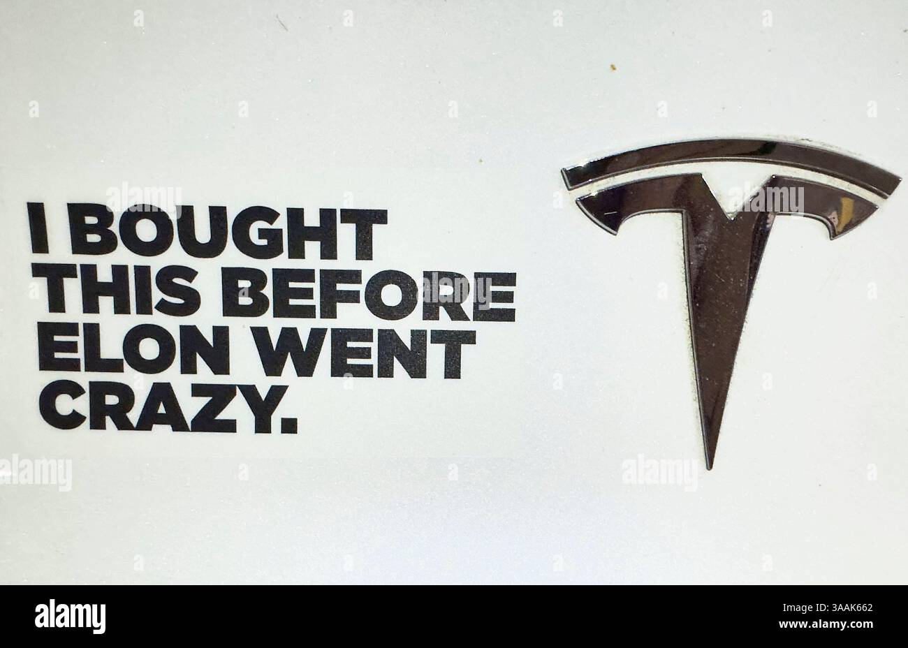 Tesla sticker I bought this before Elon went crazy on a Tesla car ...