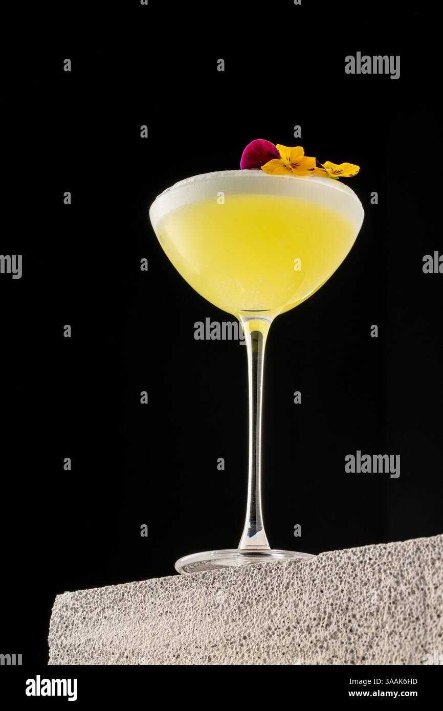 Elegant luxury cocktail in front of dark background Stock Photo - Alamy