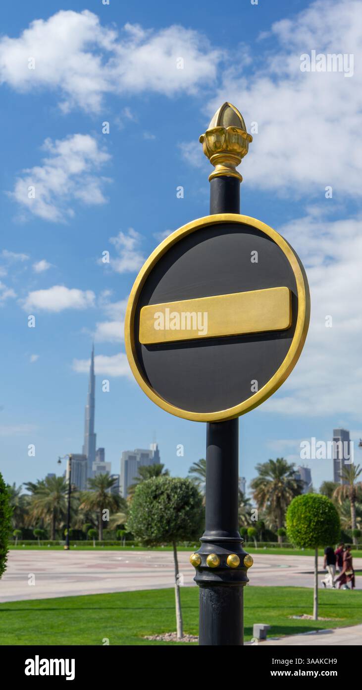 Decorative black and gold Traffic Stop Sign on road in city Dubai ...