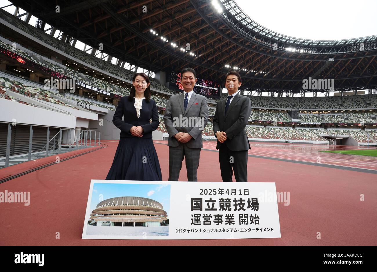 Japan National Stadium Entertainment President Koji Takeuchi (C), Vice President Hiroyuki Menjo ...