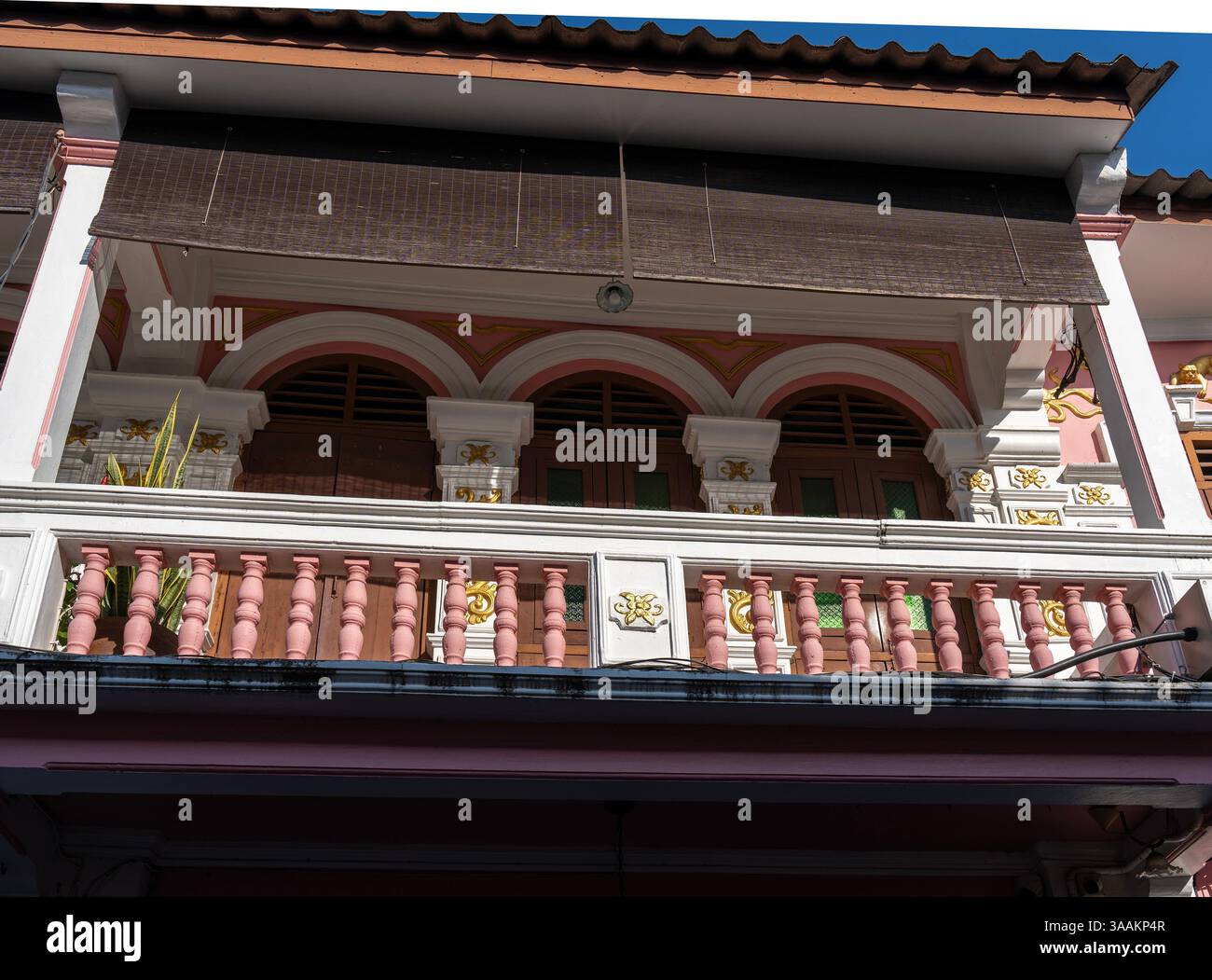 Colorful facades of Portuguese style buildings on streets of Phuket Old ...
