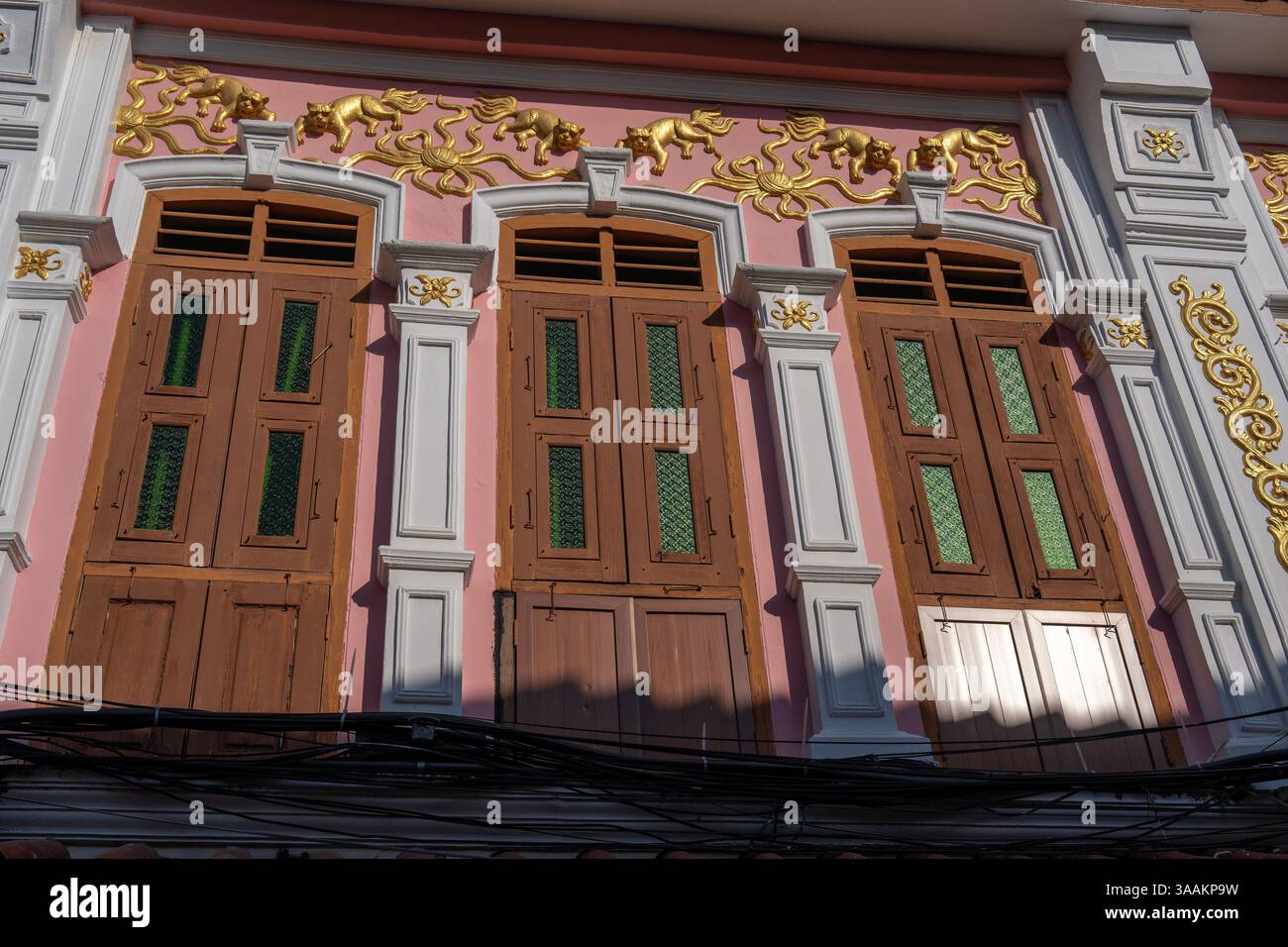 Colorful facades of Portuguese style buildings on streets of Phuket Old ...