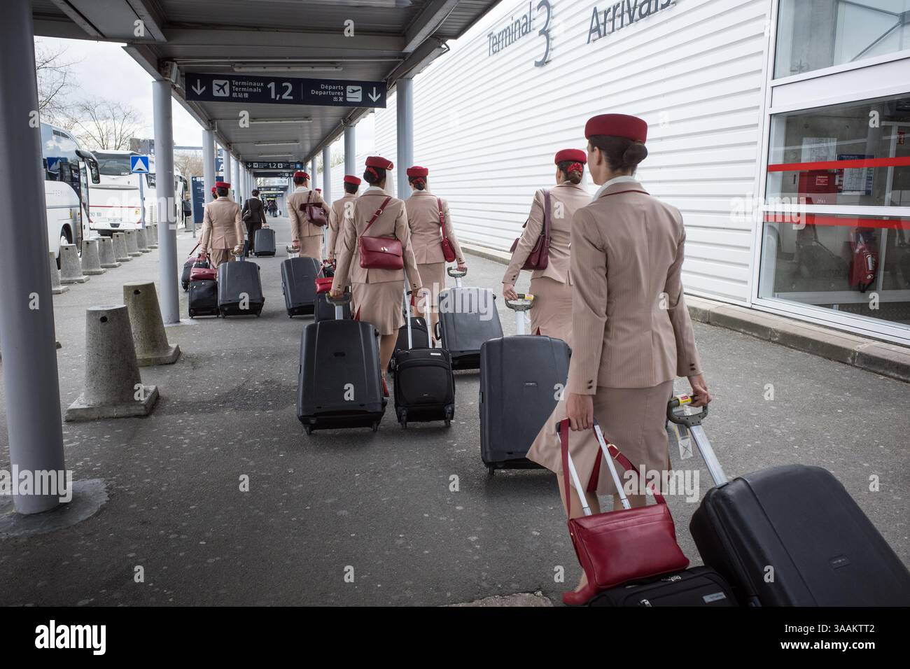 FLIGHT ATTENDANT CREW IN TRANSIT AT PARIS CHARLES DE GAULLE TERMINAL ...