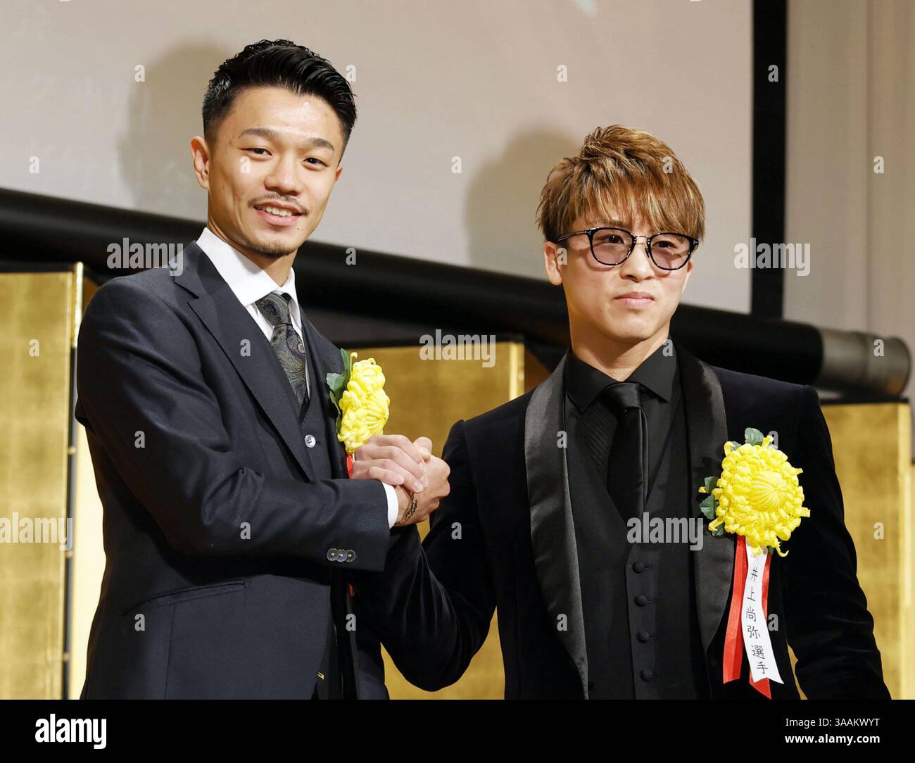 Japan's undisputed super bantamweight world champion Naoya Inoue (R ...
