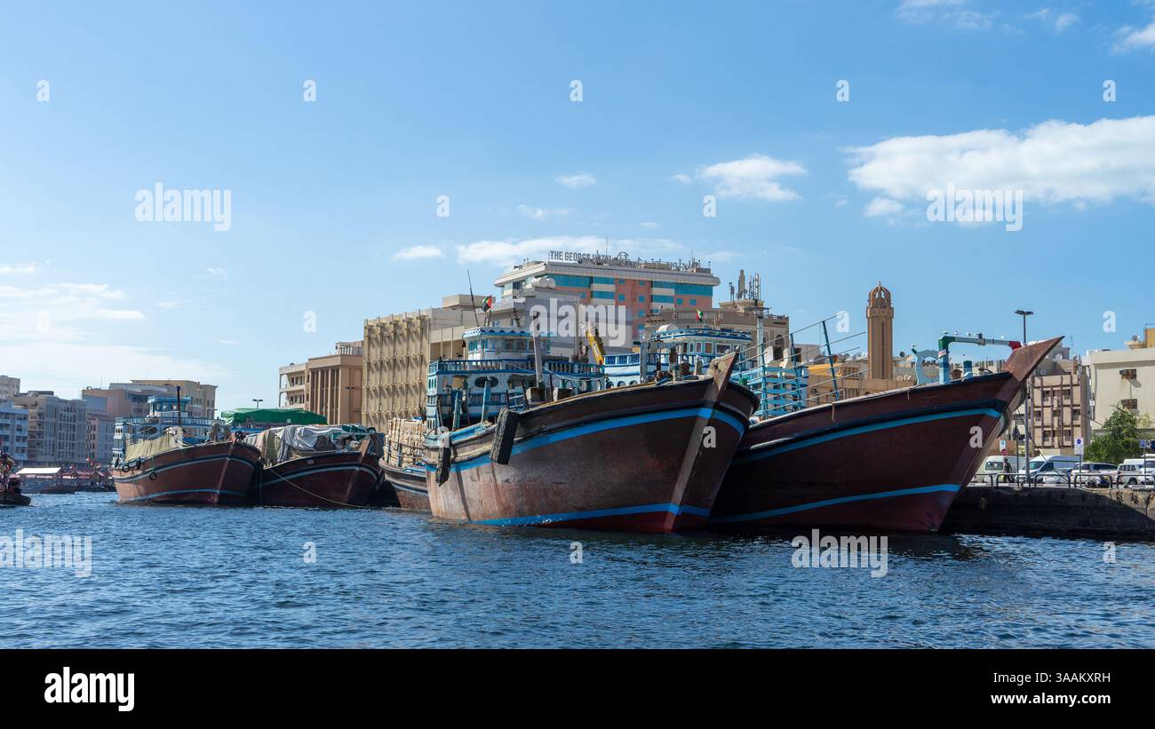 Wooden cargo ship in Bur Dubai Deira district. Dubai Creek, United Arab ...
