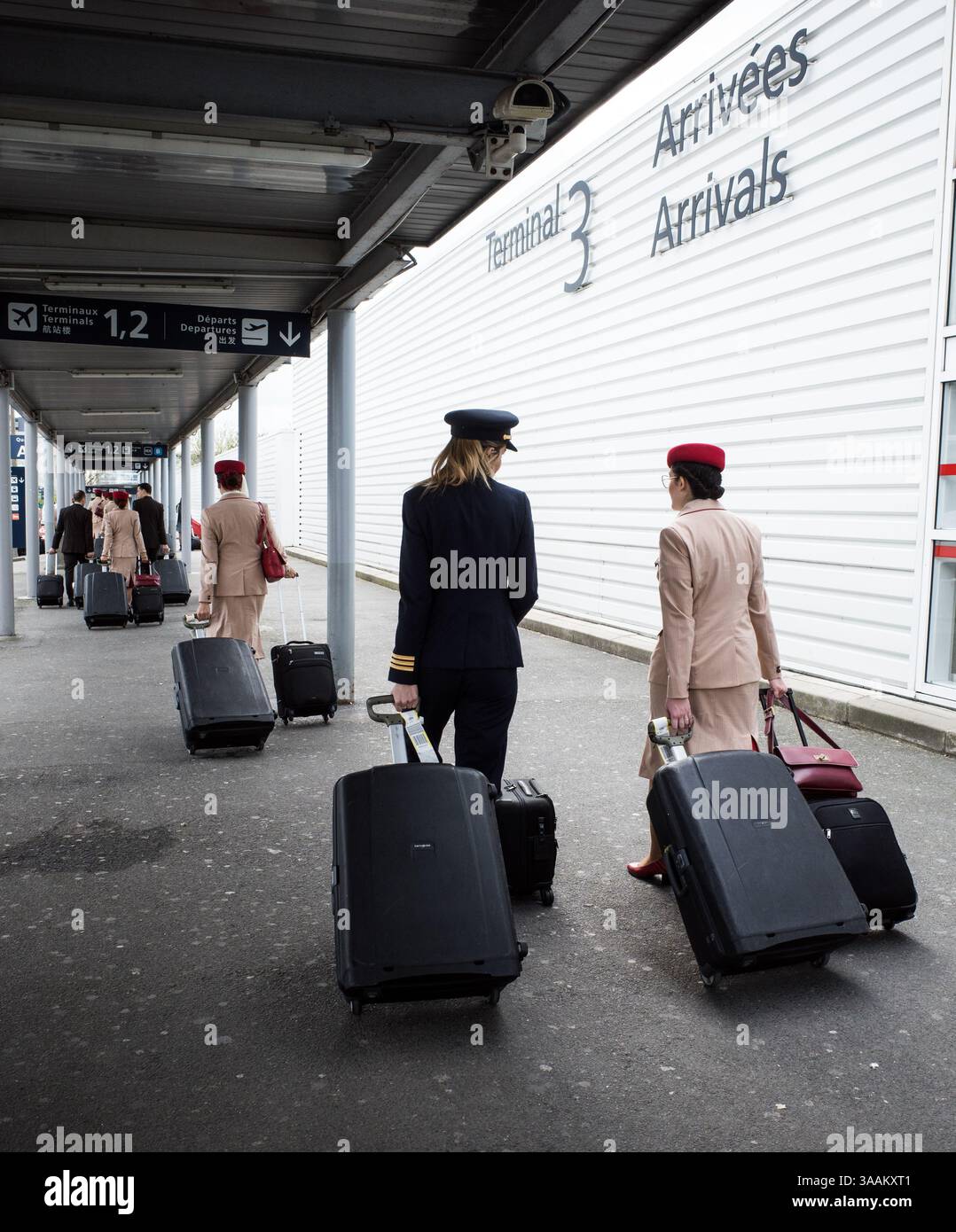 FLIGHT ATTENDANT CREW IN TRANSIT AT PARIS CHARLES DE GAULLE TERMINAL ...