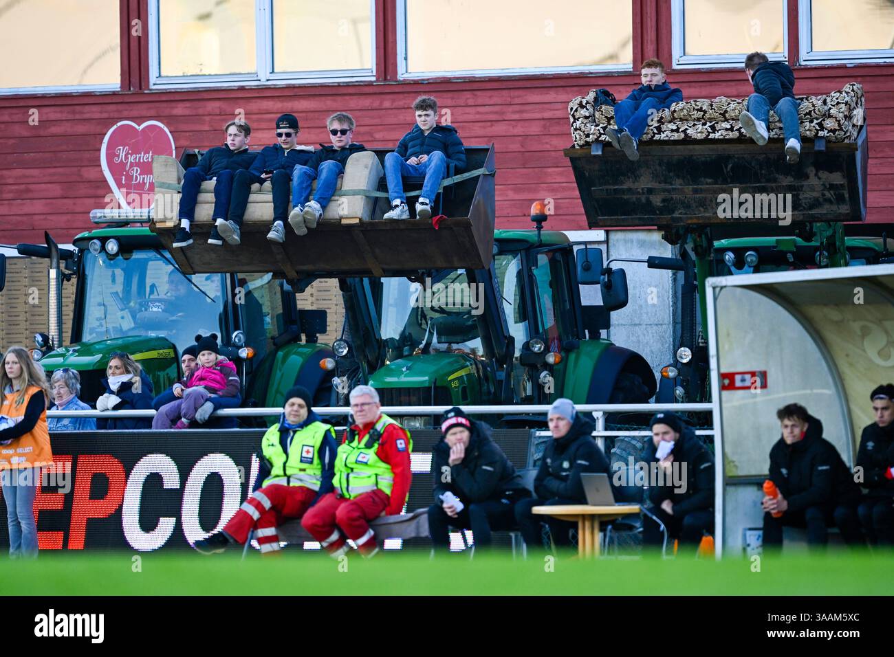 Bryne 20250330. Bryne supporters with creative solutions during the ...
