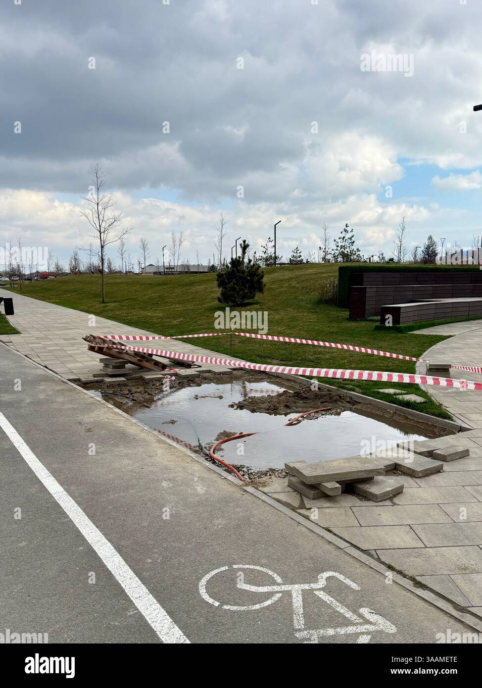 Sidewalk repair, pedestrian path on a road construction site with ...