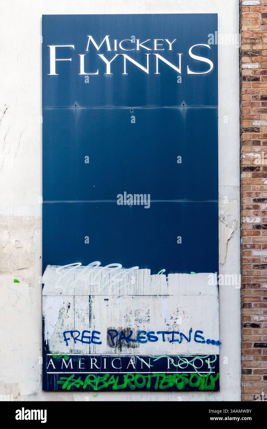 Pro Palestinian graffiti on the outside of a Mickey Flynns derelict ...