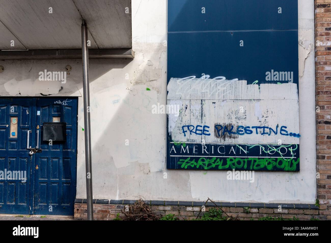 Pro Palestinian graffiti on the outside of a Mickey Flynns derelict ...
