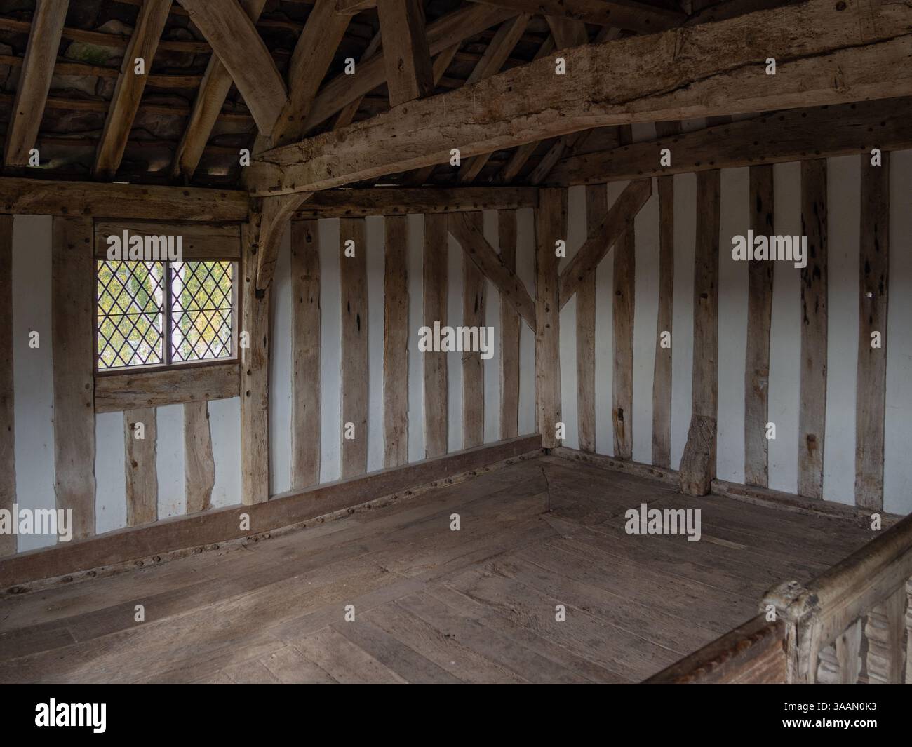 Half timbered upper floor of the 15th century gatehouse to the moated ...