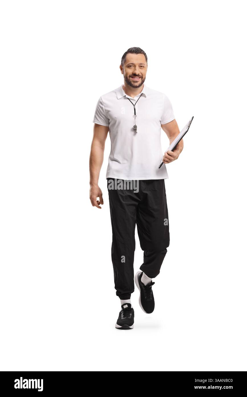 Sports coach with a whistle walking and holding a clipboard isolated on ...