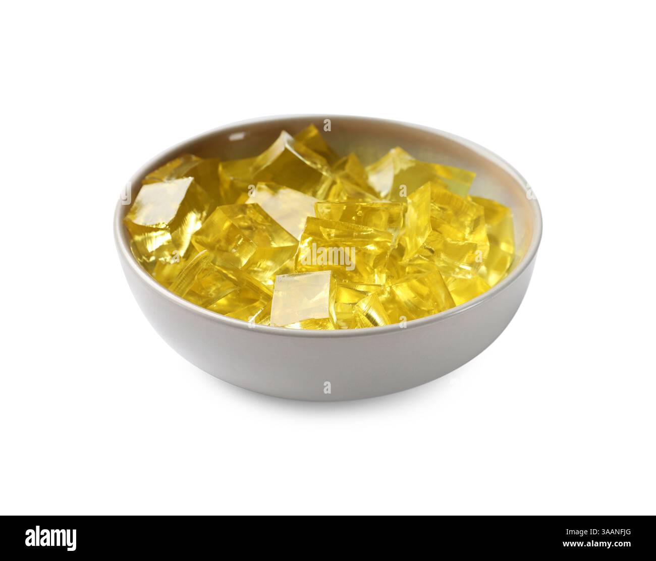 Tasty yellow jelly cubes isolated on white Stock Photo - Alamy