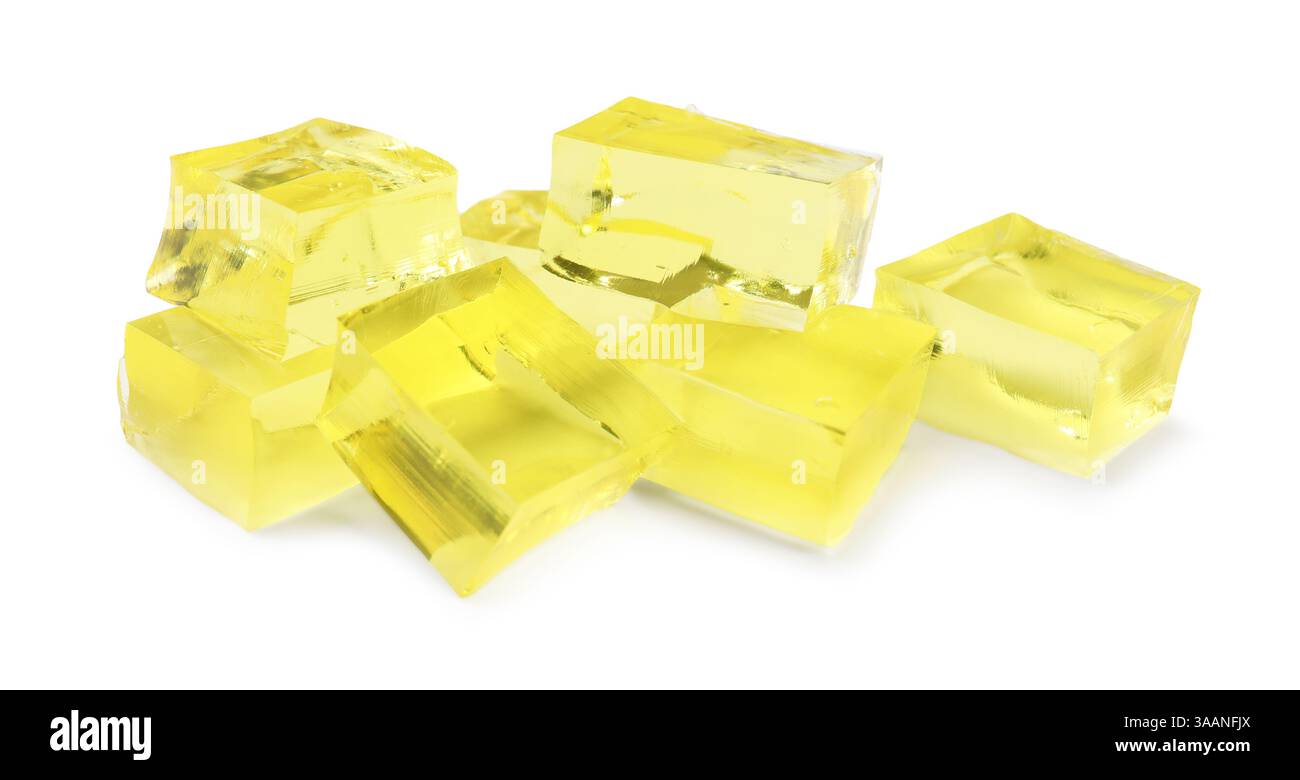 Tasty yellow jelly cubes isolated on white Stock Photo - Alamy
