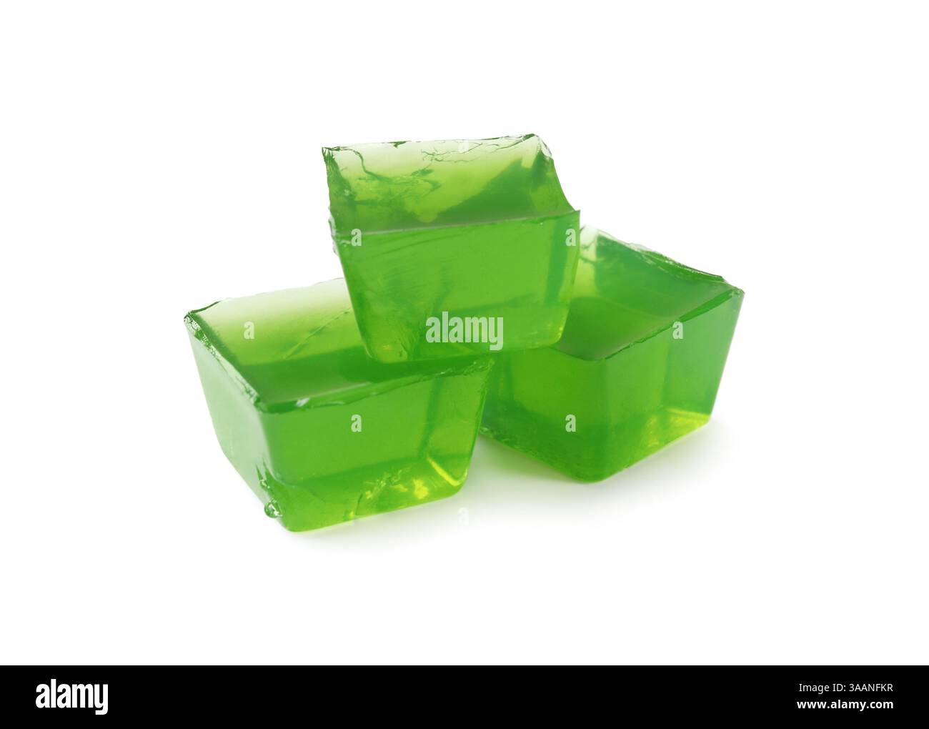 Tasty green jelly cubes isolated on white Stock Photo - Alamy