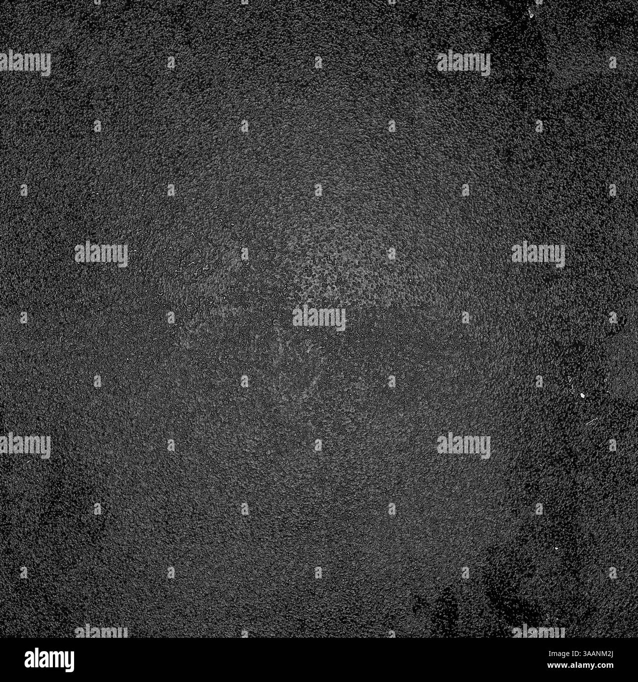 Dark grainy texture creating abstract background with vignette effect ...