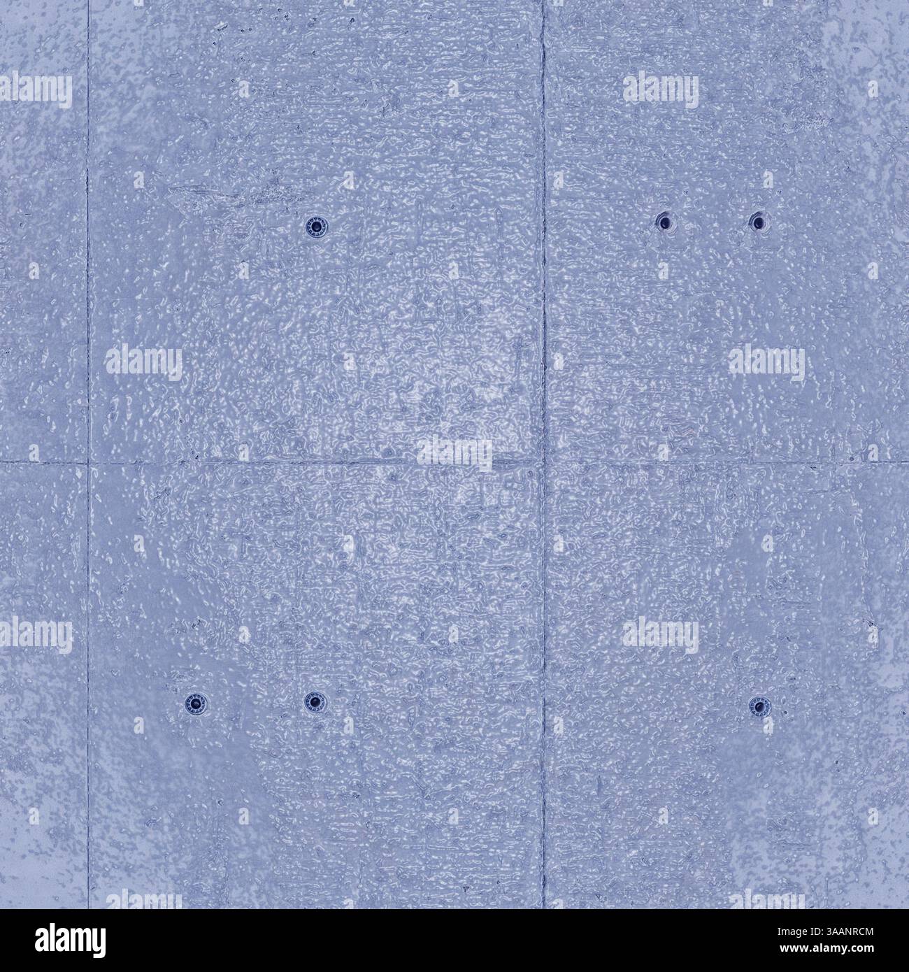 Rough textured concrete wall surface forming a repeating pattern with ...