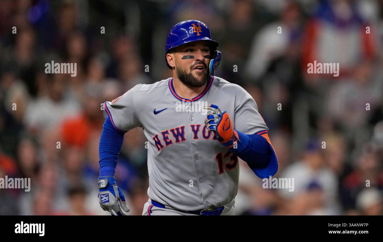 New York Mets' Luis Torrens (13) runs up the first base line against ...