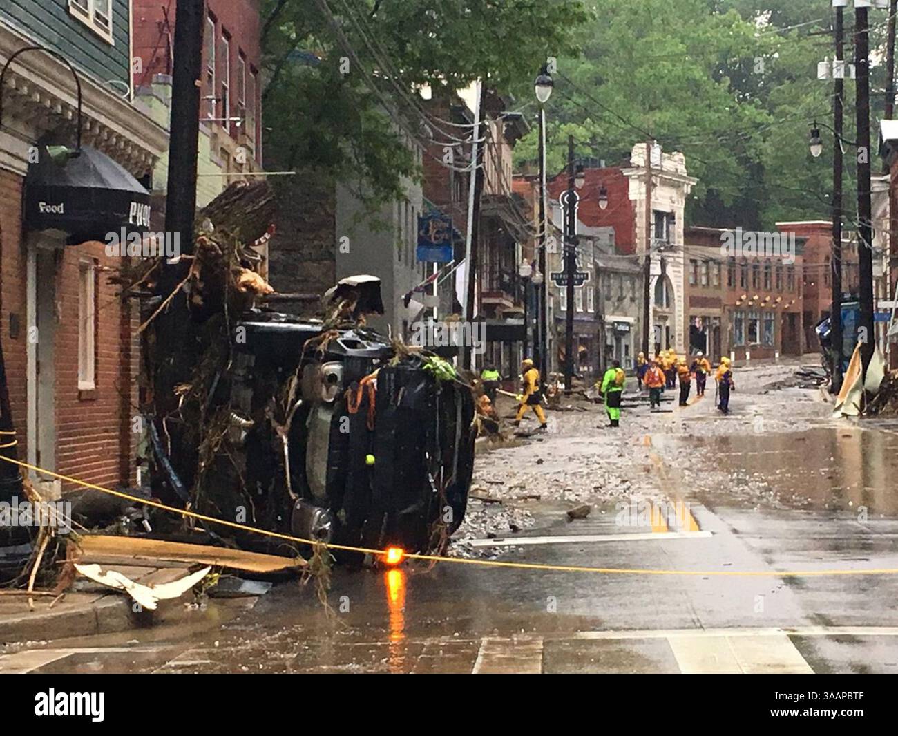 May 27, 2018 - Baltimore, Maryland, U.S. - Rescue personnel walk along ...