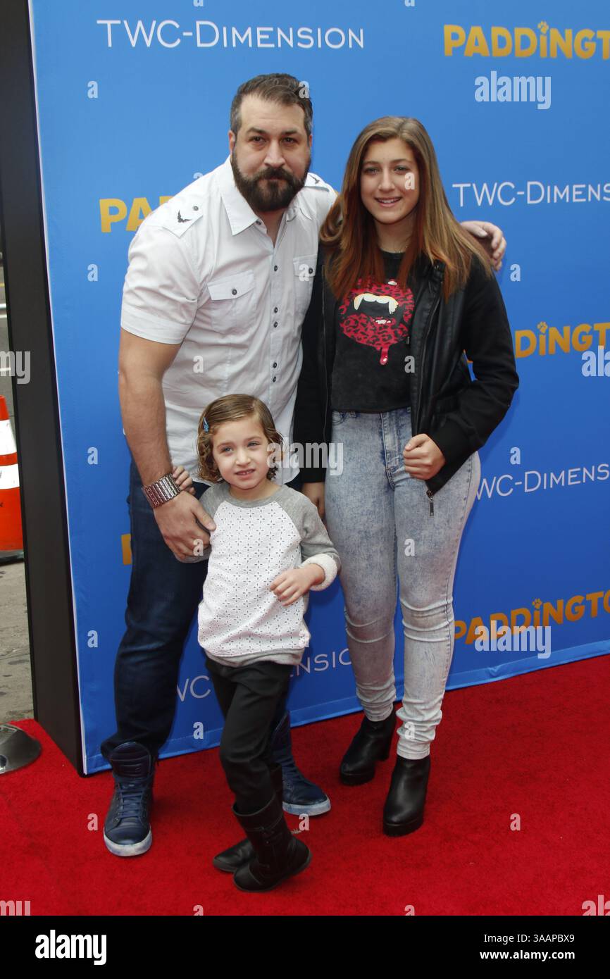 Singer Joey Fatone and daughters pose at the premiere of Paddington in ...