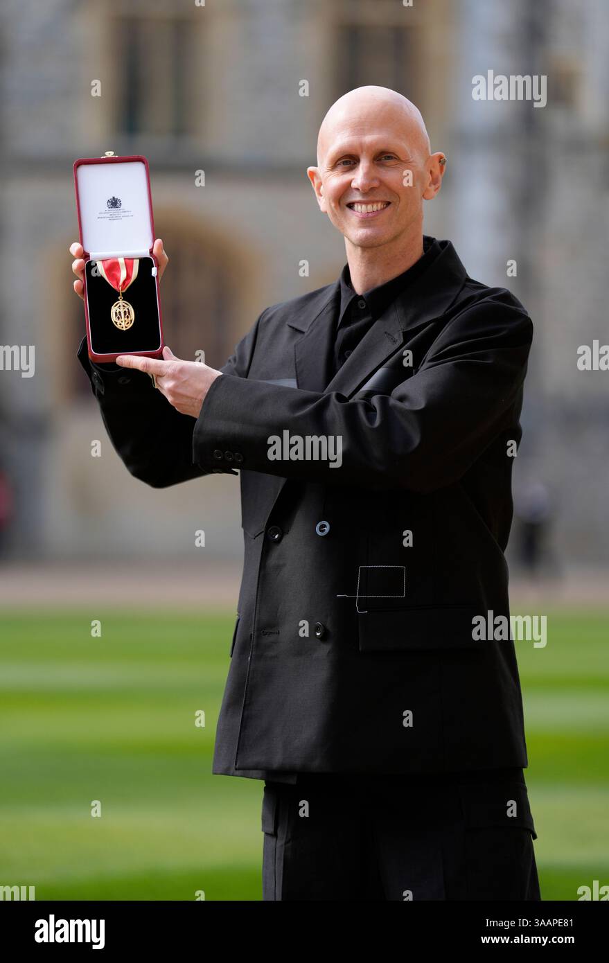 Professor Sir Wayne McGregor after being made a Knight Batchelor during an Investiture ceremony ...