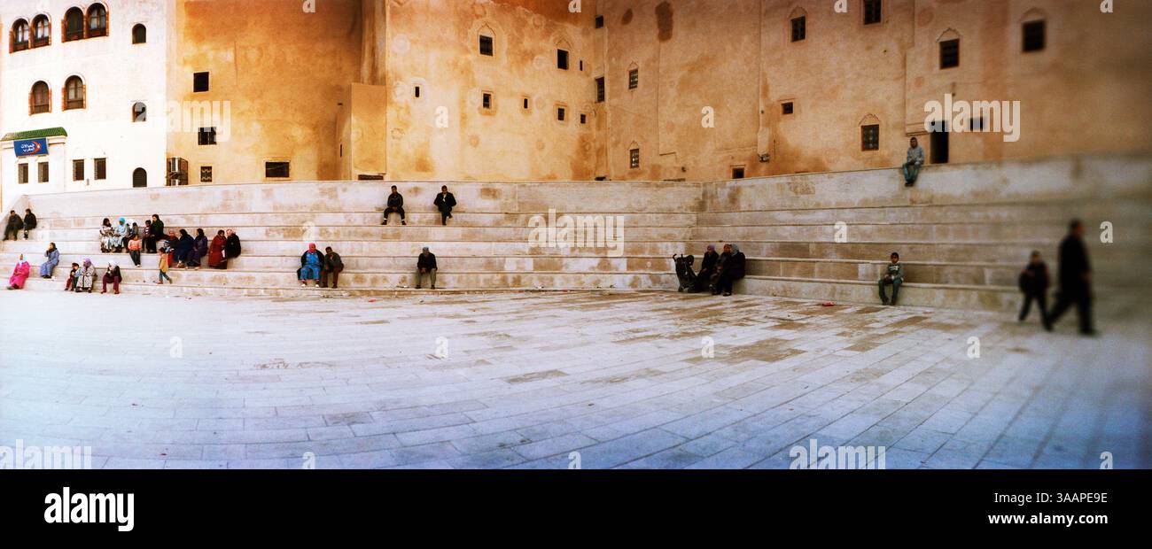 Panoramic view of people at the courtyard in the Medina, Fez, Morocco ...