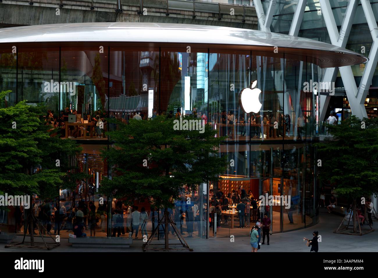 This inviting dusk image showcases the Apple Store at CentralWorld Mall ...