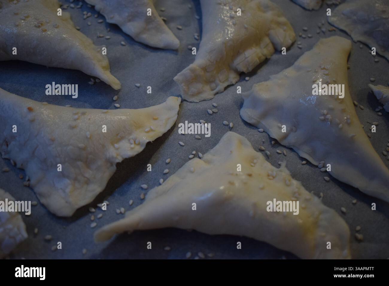 a flat baking tray lined with parchment paper, displaying neatly ...