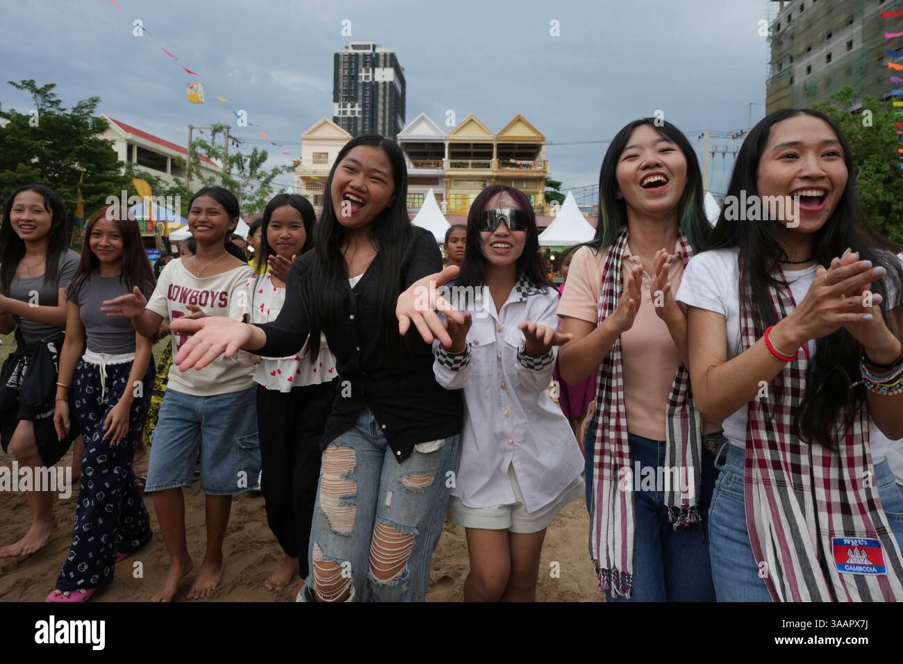 Cambodian students dance during a merit making ceremony at a secondary school of Fine Art in ...