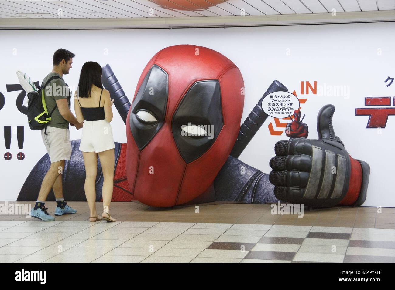 May 30, 2018 - Tokyo, Japan - People look at a big Deadpool head ...
