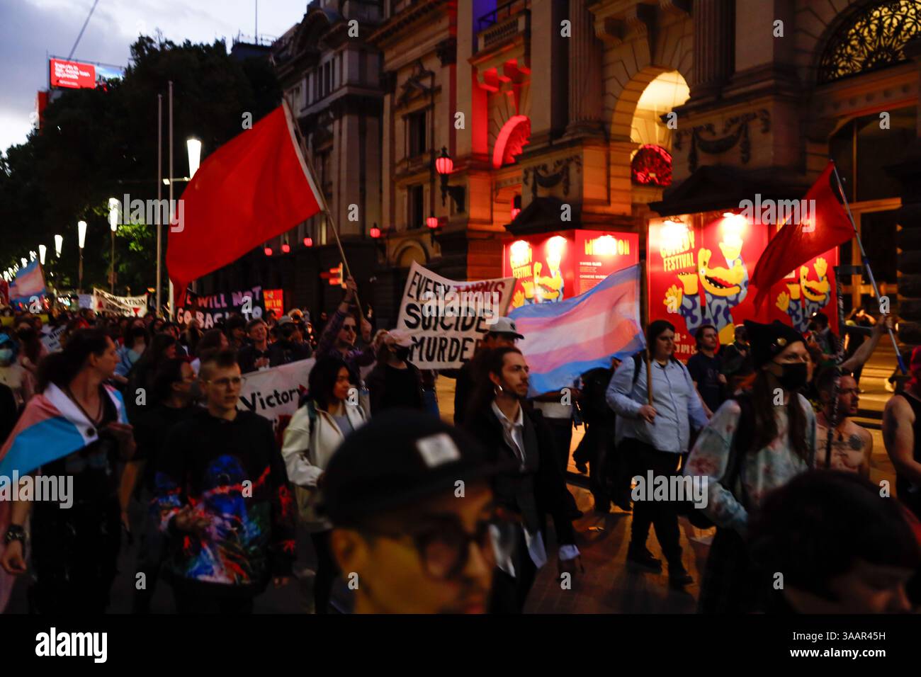 Protesters march holding banners on the streets during the rally. The ...