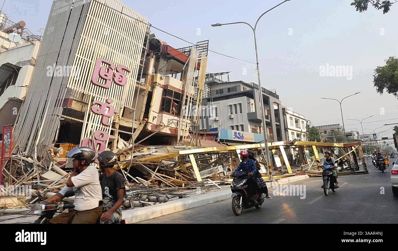 A photo shows collapsed buildings due to an earthquake, in Mandalay ...