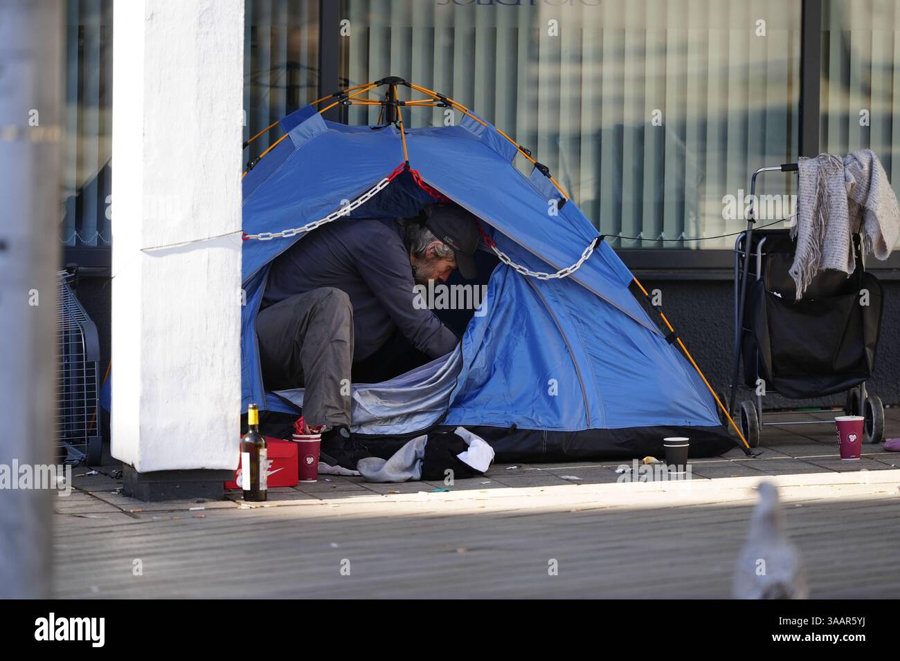 A homeless man in a tent in the centre of Liverpool. Picture date ...
