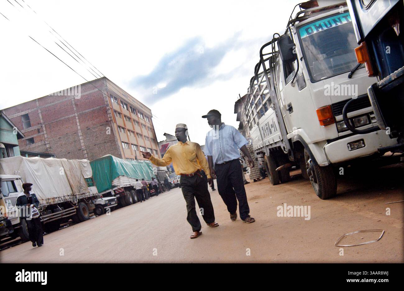 Bustling streets of Kampala Uganda, Local parking tickets shops ...